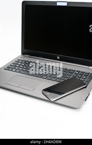 COMO, ITALY - Oct 31, 2021: laptop computer with closed lid and ...