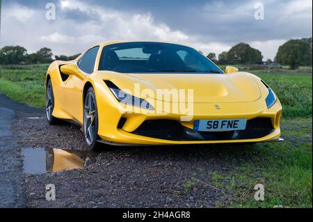 Yellow Ferrari F8 Spider sportswear photographed on the Gwent Levels ...