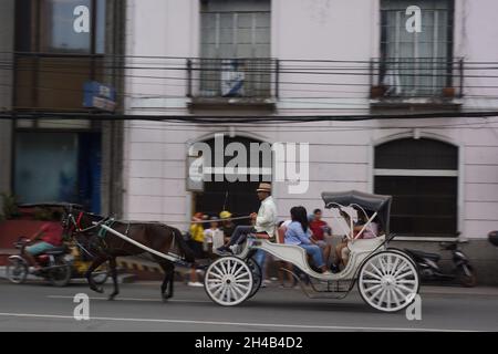 Kalesa horse drawn carriage Intramuros Manila Stock Photo - Alamy
