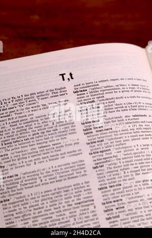 Longman Dictionary open at the letter T and other words Stock Photo - Alamy