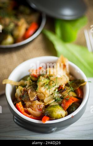 fried brussels sprouts with cauliflower and other vegetables in a bowl ...