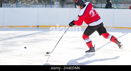 Counterattack. Professional male hockey player training in special ...