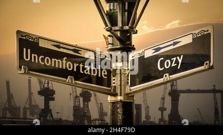 Street Sign the Direction Way to Cozy versus Uncomfortable Stock Photo ...
