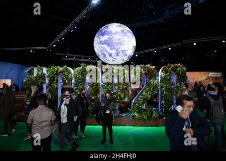 COP26 logo and the Earth at the COP26 UN Climate Change Conference in ...