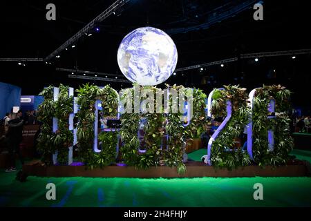 COP26 logo and the Earth at the COP26 UN Climate Change Conference in ...