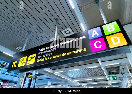 terminals direction sign hanging from ceiling in the terminal at ...