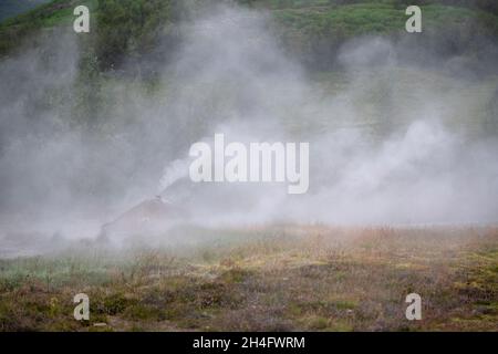 Landscape of steam coming off of Geysir Golden Circle Stock Photo - Alamy