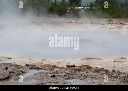 Landscape of steam coming off Geysir Golden Circle Iceland Stock Photo ...