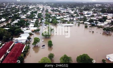 Houses in flood risk area with flood defense wall for protection from ...