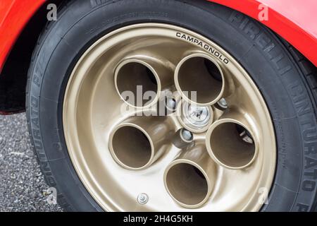 Close up detail of a gold Campagnolo Bravo alloy wheel on a red ...
