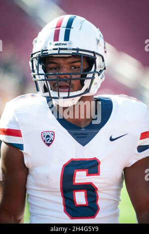 Arizona running back Michael Wiley (6) scores a touchdown between Utah ...