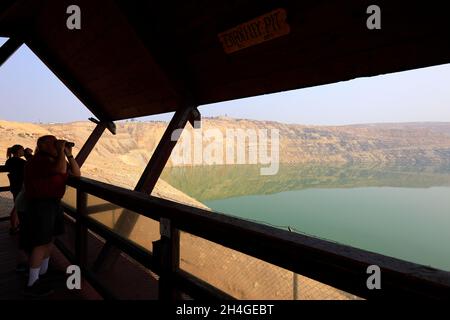 Visitors at viewing platform looking at Berkeley Pit, an open pit ...