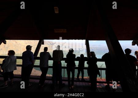 Visitors at viewing platform looking at Berkeley Pit, an open pit ...