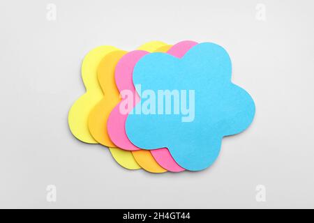 Sticky notes in shape of flowers on white background Stock Photo - Alamy