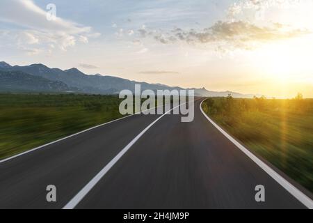 Scenic road. Road is surrounded by a magnificent natural landscape ...