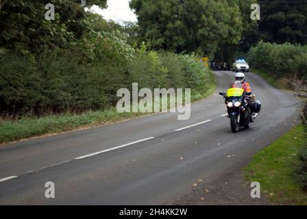 Motorcycle support vehicle for cyclists in Curlew Cup women's cycle ...