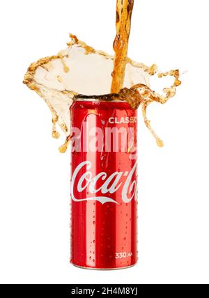 Coca cola can splashing in to water on black background Stock Photo - Alamy