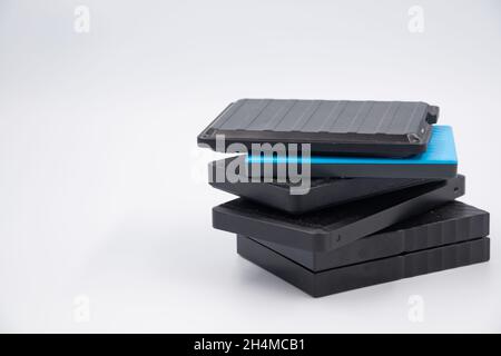 Small portable hard drives in stack Stock Photo - Alamy