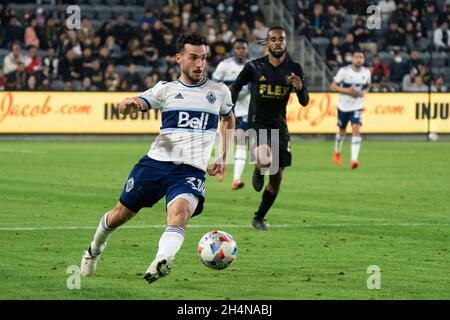 Vancouver Whitecaps' Russell Teibert (31) escapes a tackle by Montreal ...