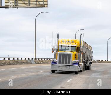 long semi-trailer with an open top truck cargo Stock Photo - Alamy