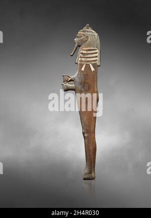 Egyptian Wood carvings of god Amset from a sarcophagus the "son of ...