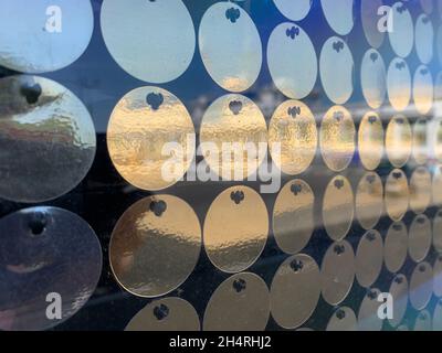 Background of golden circles with hearts Stock Photo - Alamy