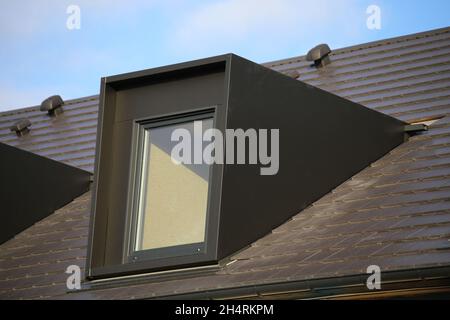 Dormer with zinc cladding on a tiled roof Stock Photo - Alamy
