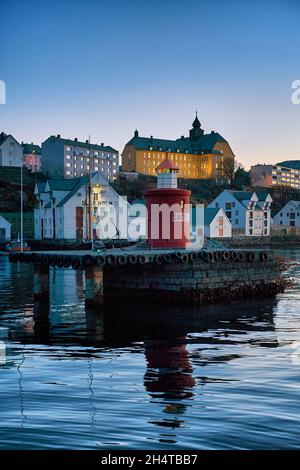 View of lighthouse in the harbor of Ålesund in Norway Stock Photo - Alamy