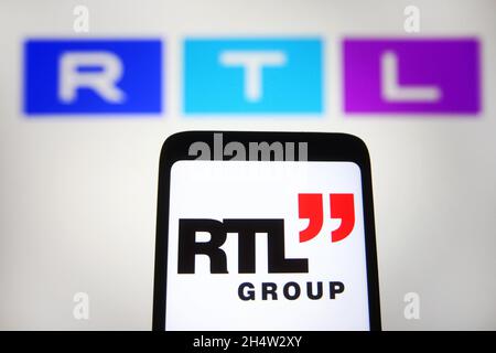 In this photo illustration, the RTL + logo is displayed on a smartphone ...
