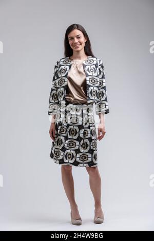 Beauty sensual woman in a suit with a pattern on the face, halloween ...