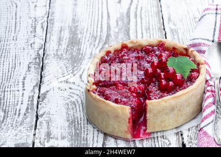 Freshly baked red currant pie on white wooden table Stock Photo - Alamy