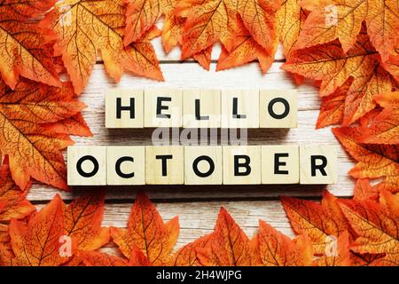 Happy October alphabet letter with maple leaves decoration on wooden ...