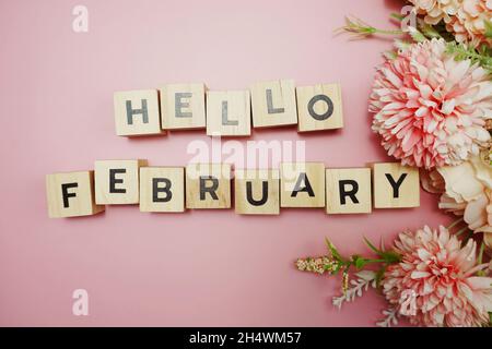 Hello February alphabet letter on shelves wooden background Stock Photo ...
