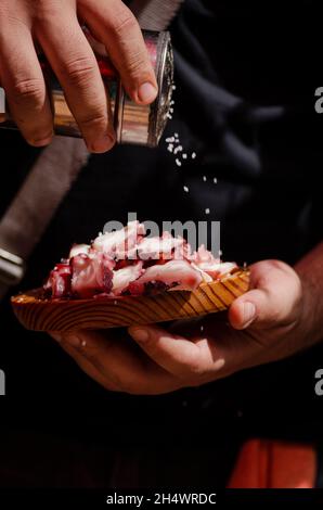 Ration of octopus a feira, dish of the traditional recipe of the ...