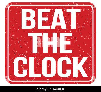BEAT THE CLOCK text written on red rectangle stamp sign Stock Photo - Alamy