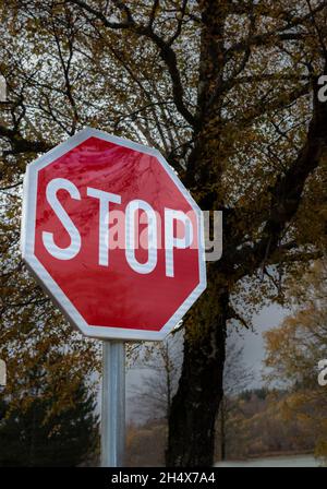 Stop sign with a beautiful background. Peaceful rural area view. Summer ...