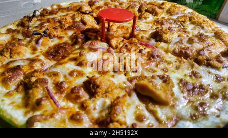 Closeup shot of a cheesy pizza in a box Stock Photo - Alamy