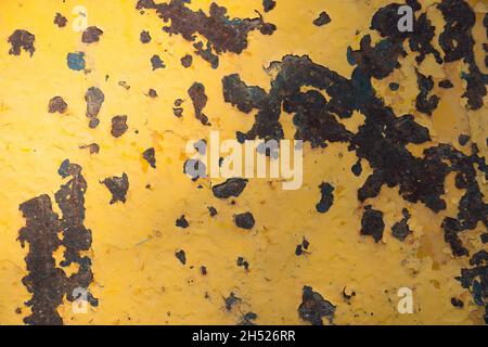 Yellow painted metal with rust and distress Stock Photo - Alamy