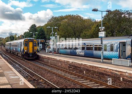 A Scotrail Class 156 diesel multiple unit train sits at platform 10 of ...