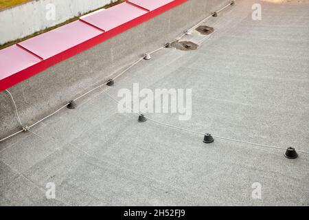 Lightning rod on rooftop. House roof lightning protection systems with ...