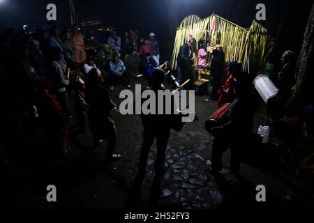 Soppeng, Indonesia. 03rd Nov, 2021. Cirowali residents hold a ...