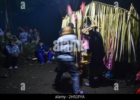 Soppeng, Indonesia. 03rd Nov, 2021. Cirowali residents hold a ...