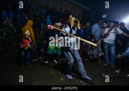 Soppeng, Indonesia. 03rd Nov, 2021. Cirowali residents hold a ...