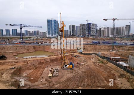 Piling driven into ground. Deep foundation installation. Reinforce ...