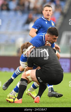 Sam Cane of New Zealand is tackled by Cheslin Kolbe of South AfricaE ...
