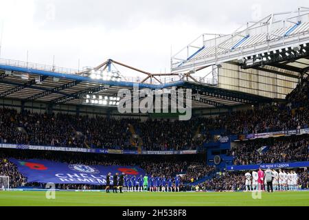 Chelsea and Burnley players observe a moments silence in honour of ...