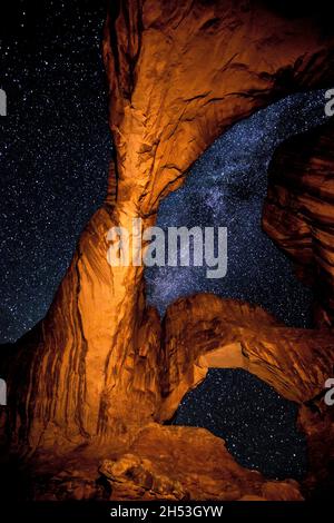 Double Arch at night with the MIlky Way & artificial light painting ...