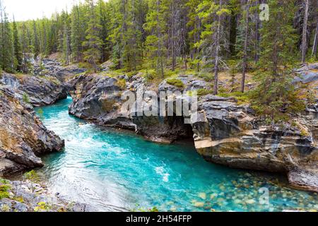 The canyon with the rocks and the teal water Stock Photo - Alamy