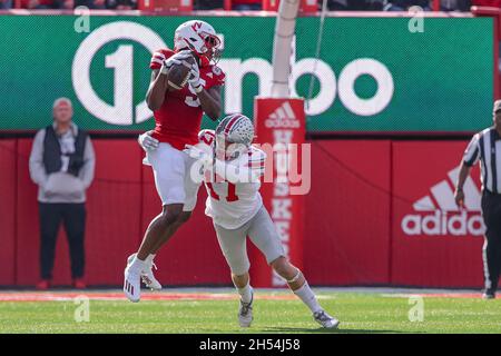 Ohio State wide receiver Bryson Rodgers is tackled by Notre Dame safety ...