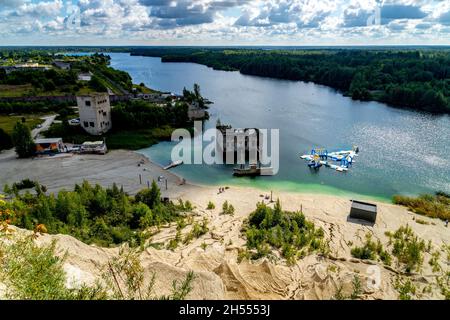 Underwater surface view of Rummu quarry in Estonia with clear turquoise ...